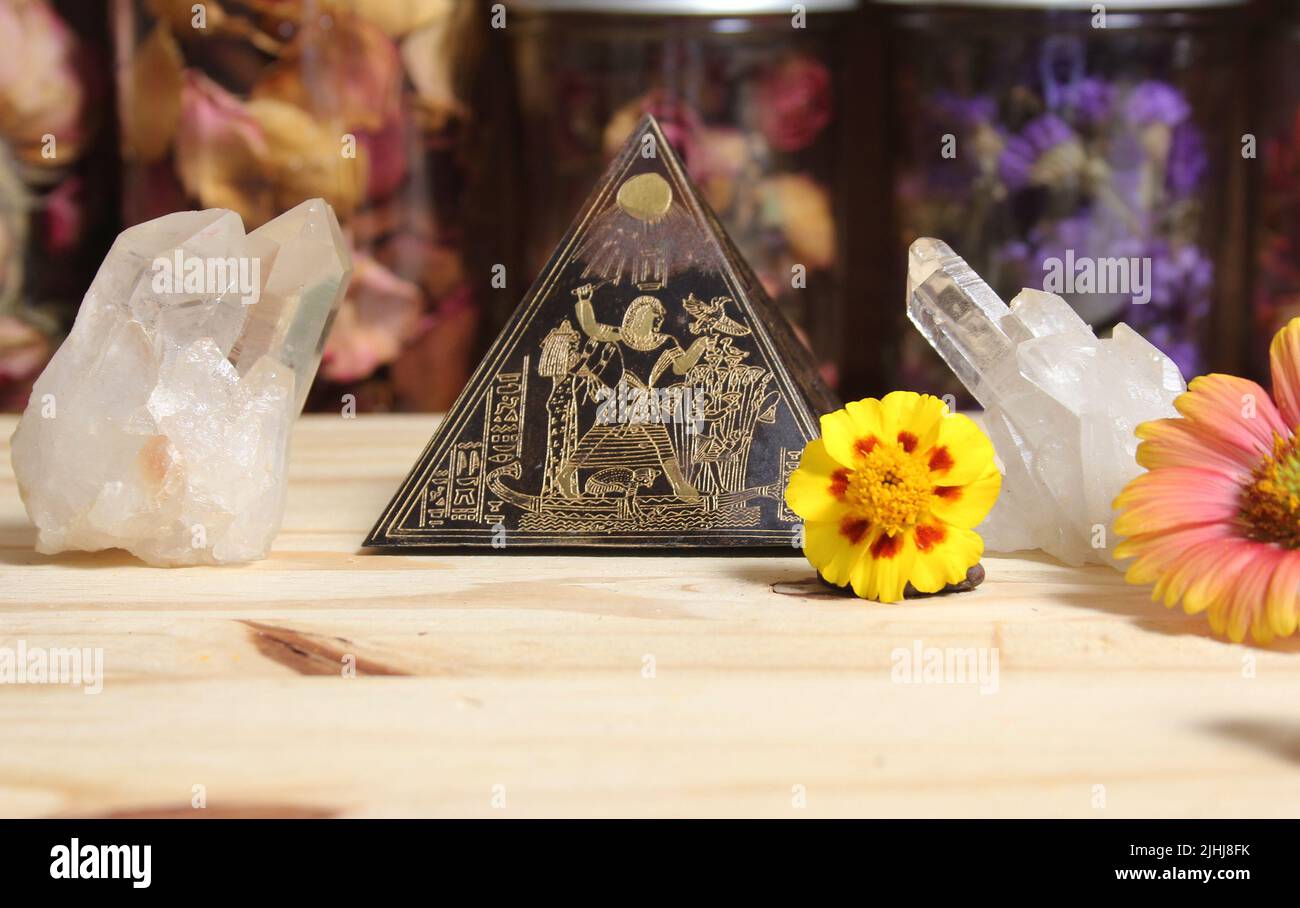 Quartz Crystals and Stone Pyramid With Flower. Relaxation and ...