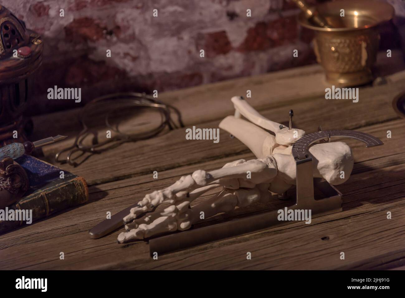 Old trauma doctor study table. vintage still life Stock Photo - Alamy