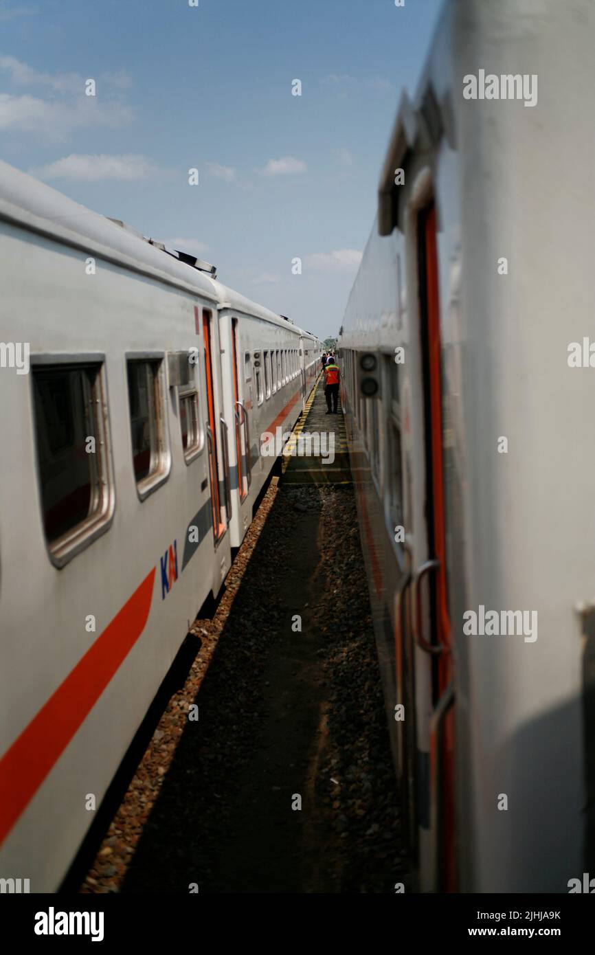 Passanger train stopped at station in Java Island Indonesia Stock Photo ...