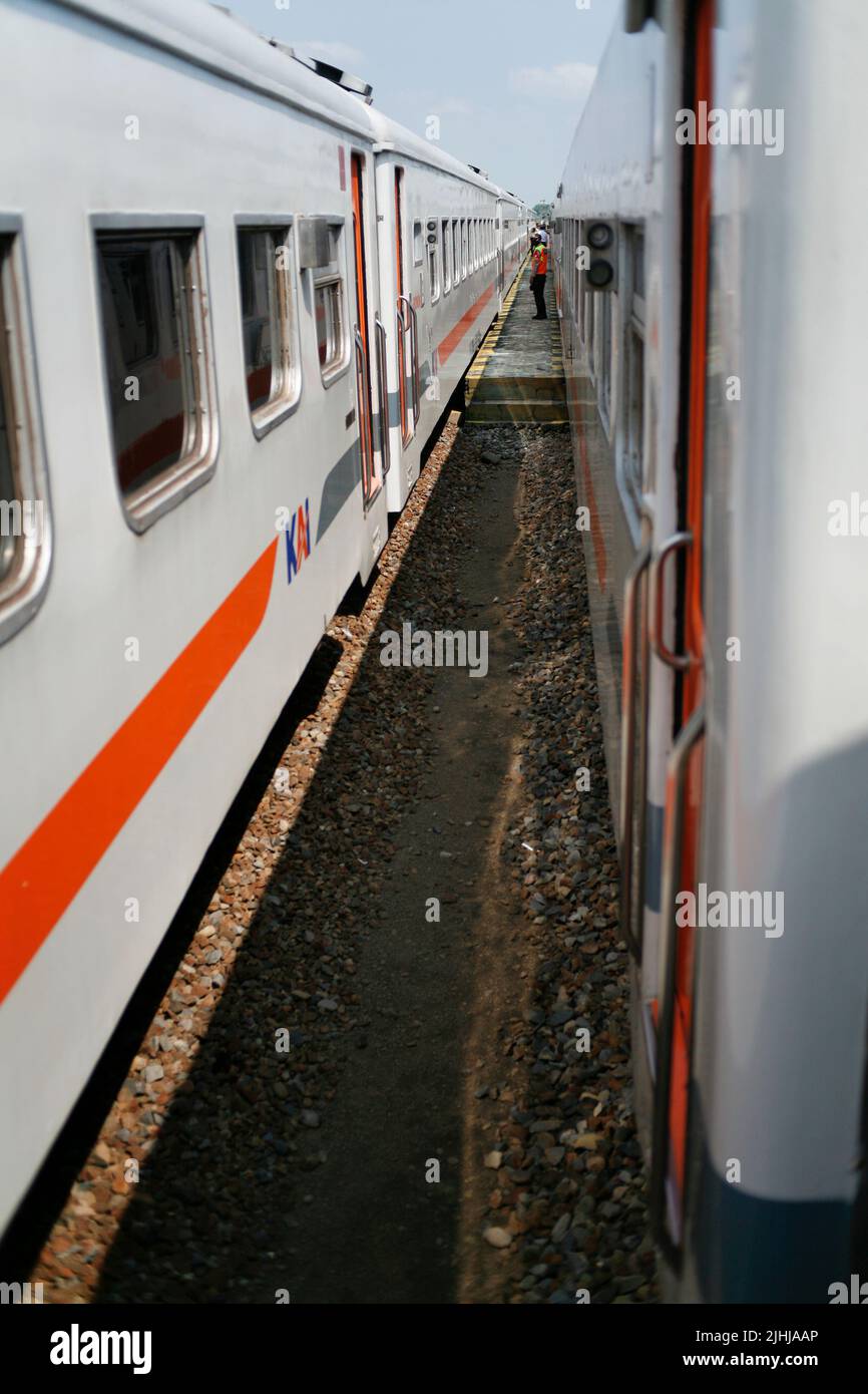 Passanger train stopped at station in Java Island Indonesia Stock Photo ...