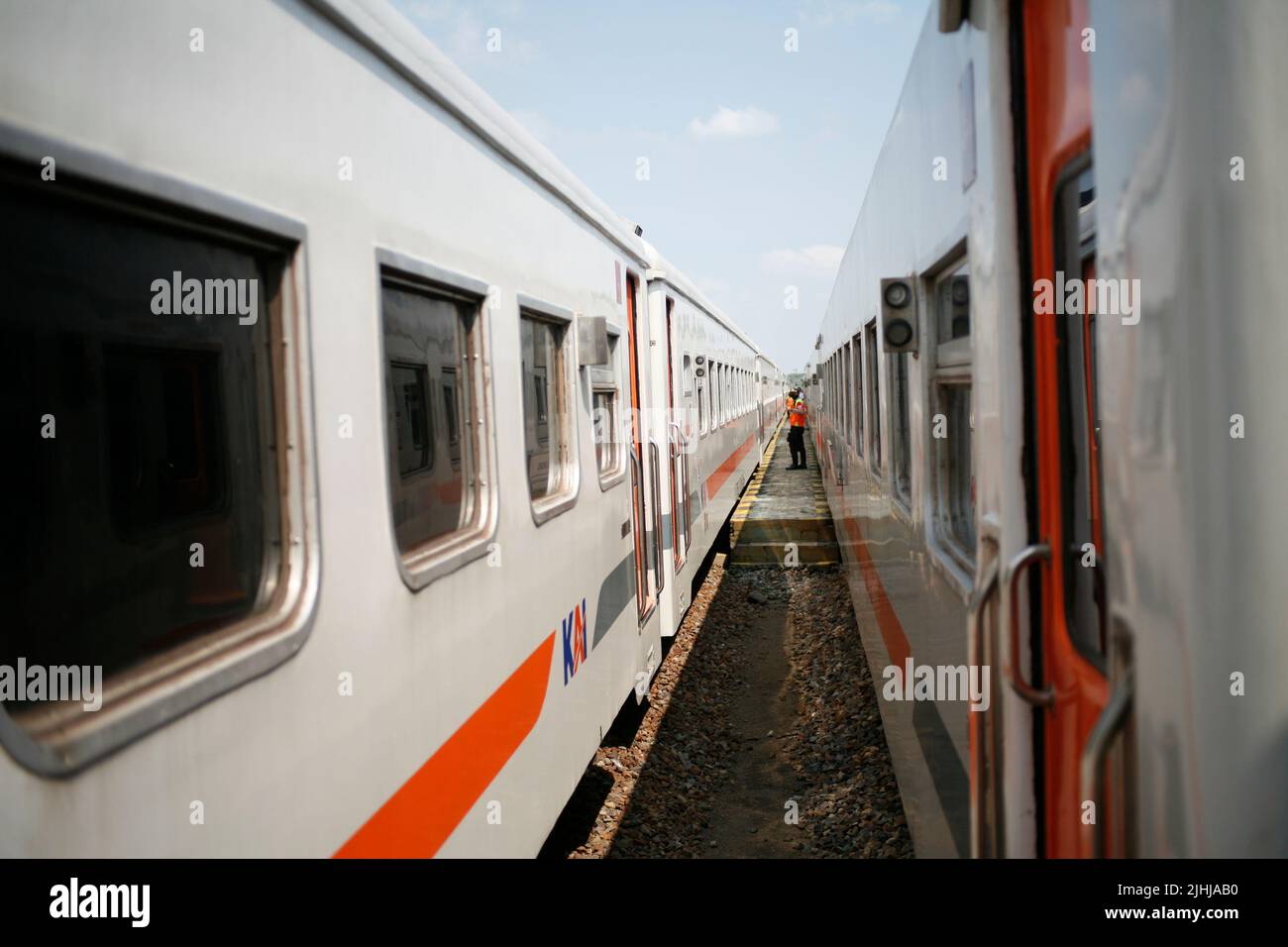 Passanger train stopped at station in Java Island Indonesia Stock Photo ...