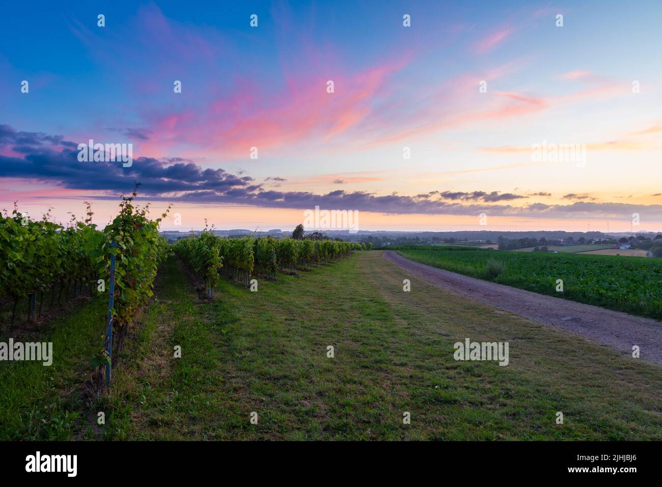 Colorful sunrise over Vijlen and its church, the only mountain village ...