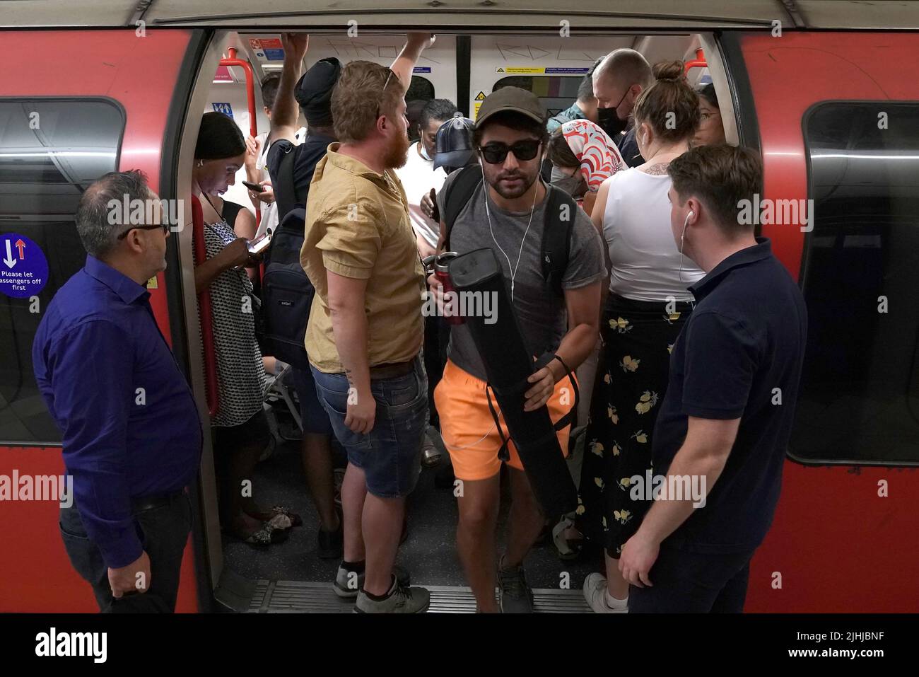 People pack into a Central Line train in London. Britons are set to ...