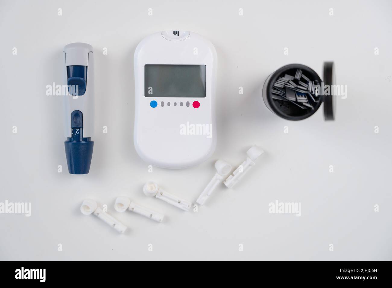 Home blood glucose test kit. Glucometer, lancet pen, needles and text ...