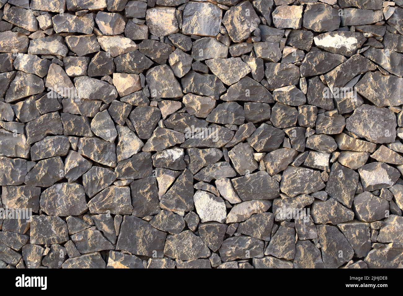 a Gray stone wall texture pattern background Stock Photo - Alamy