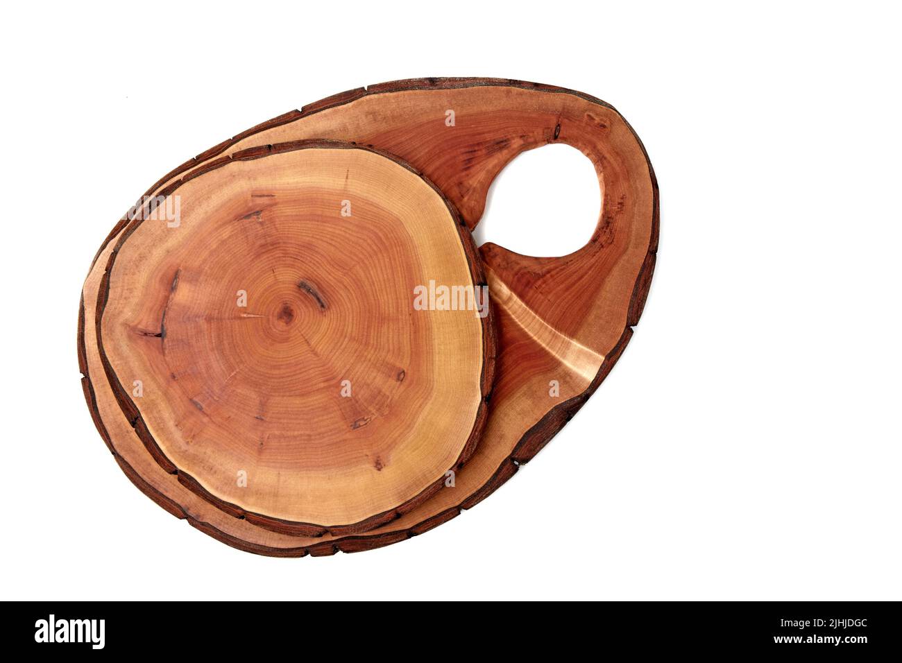 Wooden cutting boards isolated on white background. Tree trunk cut for ...