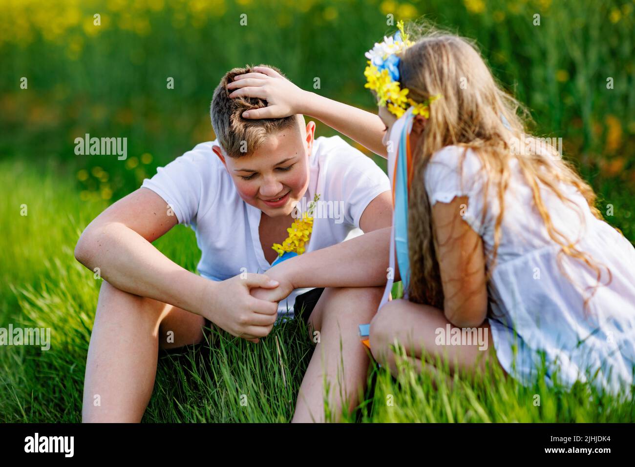 Native joyful teenage children enjoying warm weather: big strong kind ...