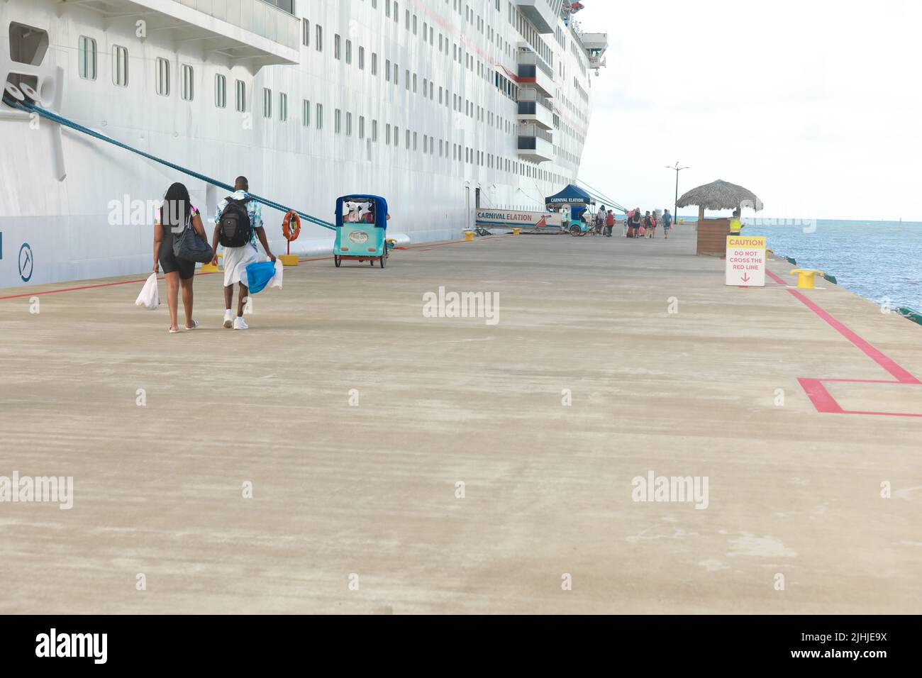 Bicycle rickshaw transferring guests from cruise ship terminal complex ...