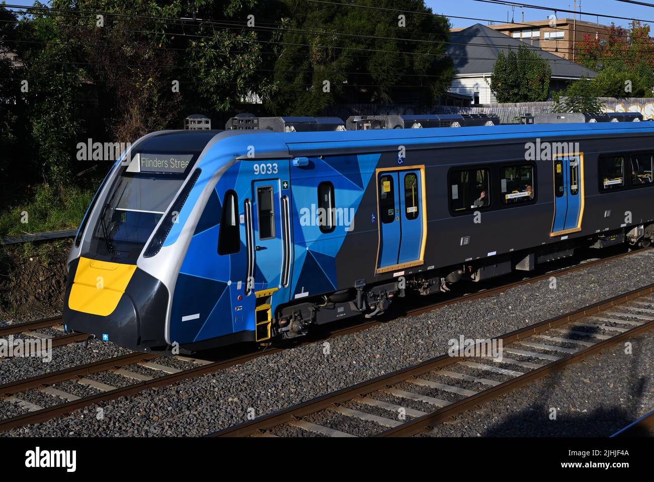 Side view of a new HCMT's front carriage, with blue and yellow Metro ...