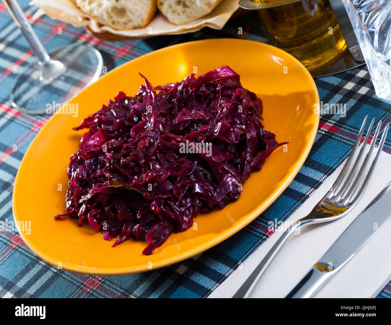 Braised red cabbage on a plate closeup Stock Photo - Alamy