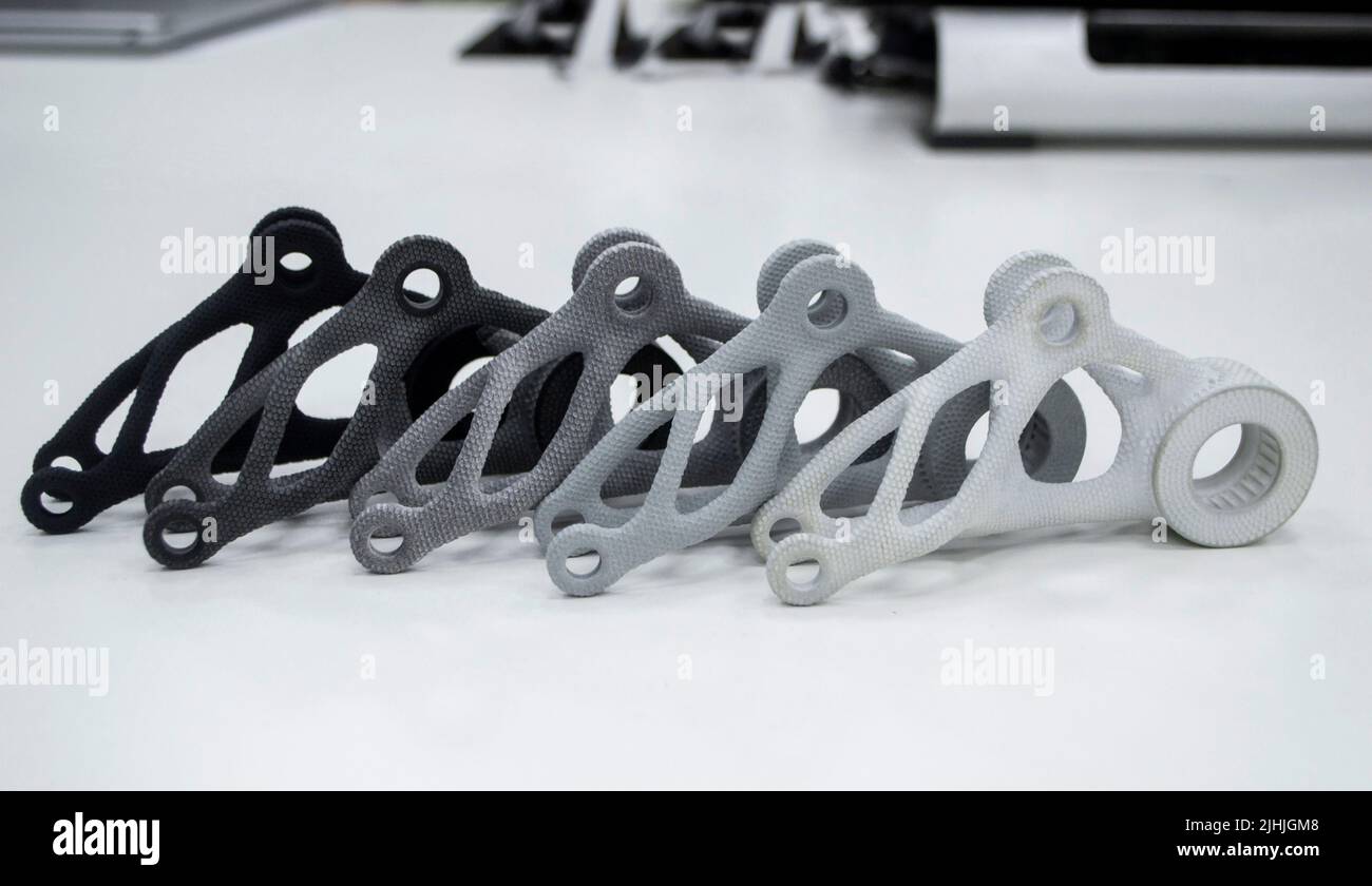 Black white gray models printed on 3D printer in laboratory office ...