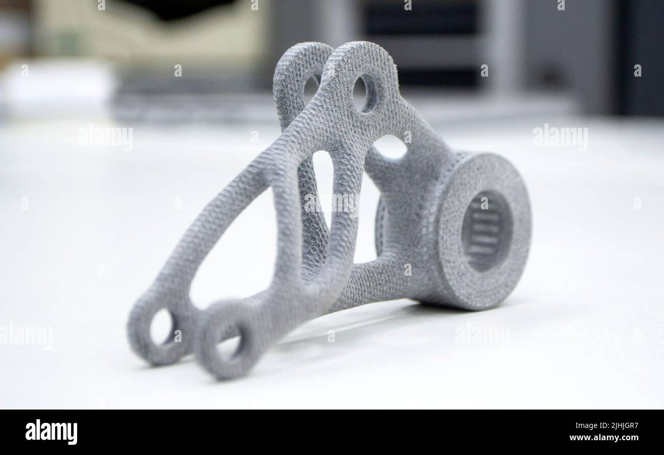 Gray model printed on 3D printer in laboratory office. Object printed ...