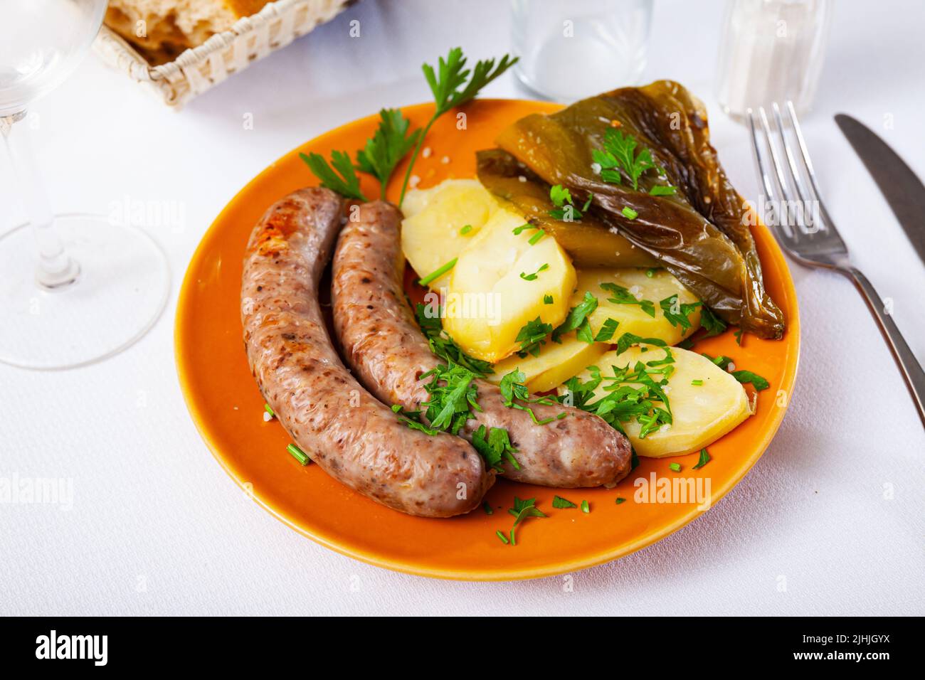 Grilled sausages with boiled potato and pepper Stock Photo - Alamy