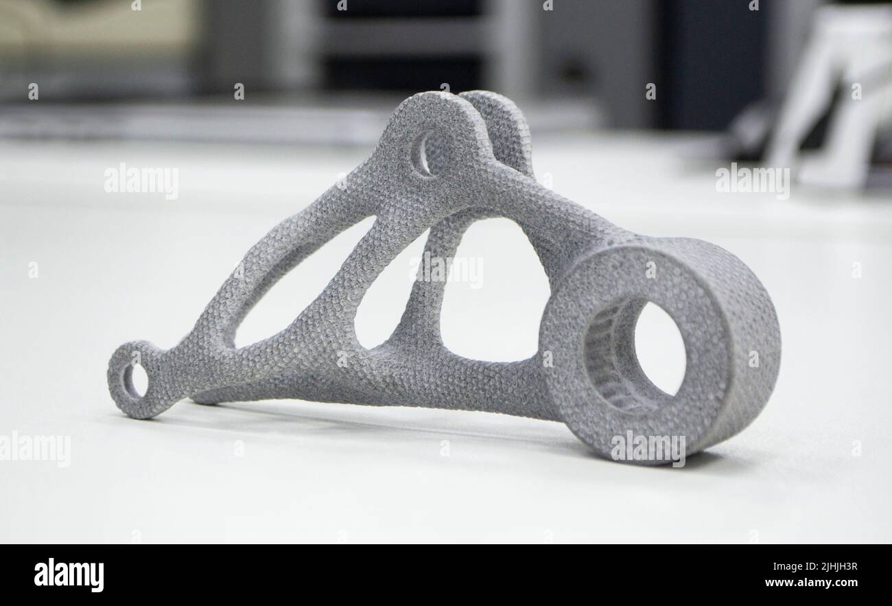 Gray model printed on 3D printer in laboratory office. Object printed ...