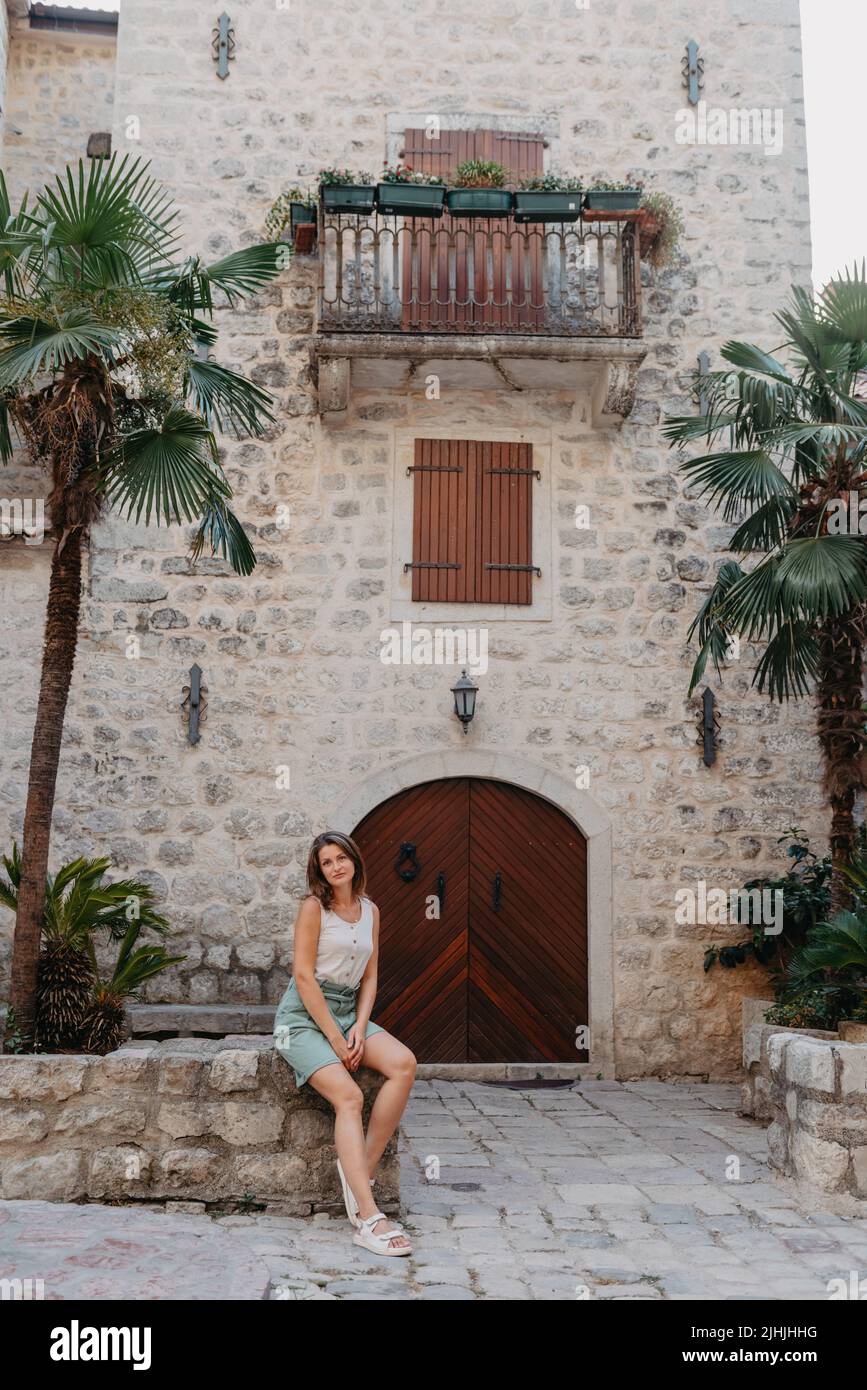 Girl Tourist Resting in the Ancient Narrow Street On A Beautiful Summer ...
