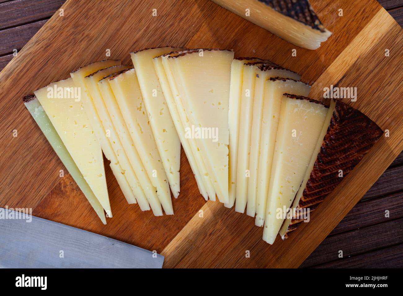 Sliced italian cured sheep cheese Pecorino Stock Photo - Alamy