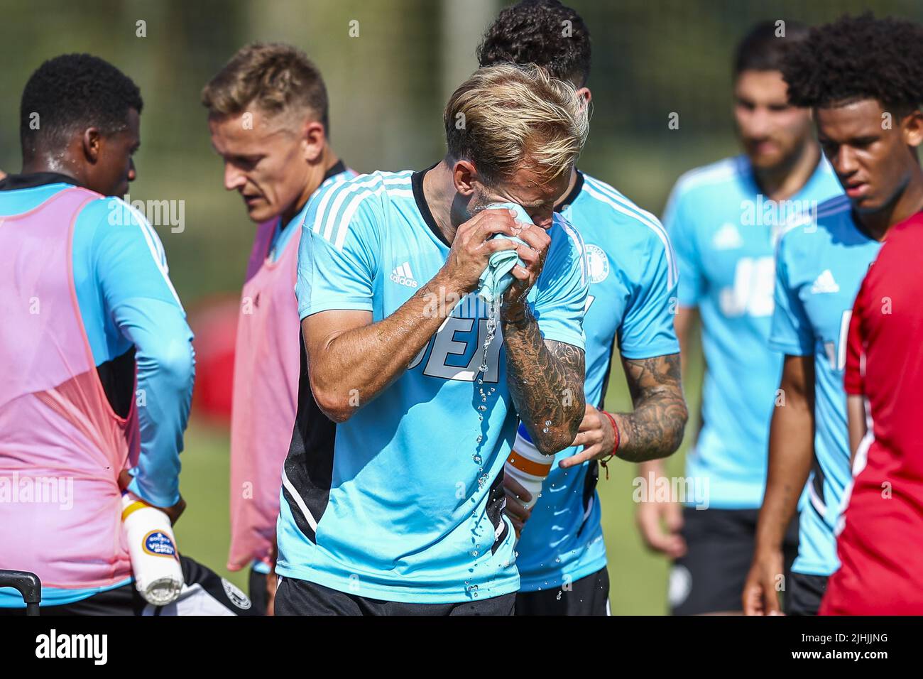 DE LUTTE - Feyenoord players are looking to cool down during a drinking ...