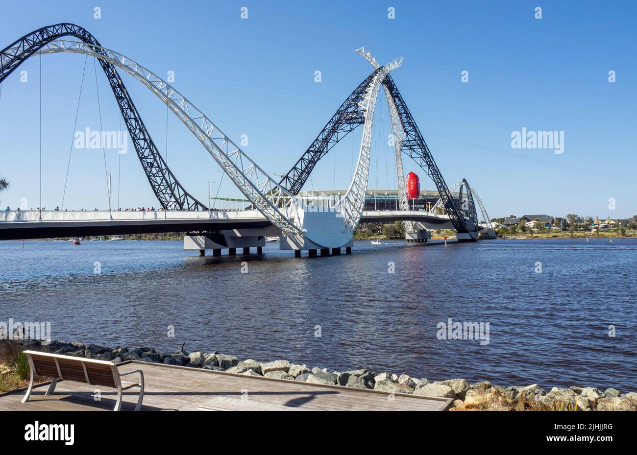 Spectators walking across Matagarup Bridge with a suspended inflatable ...
