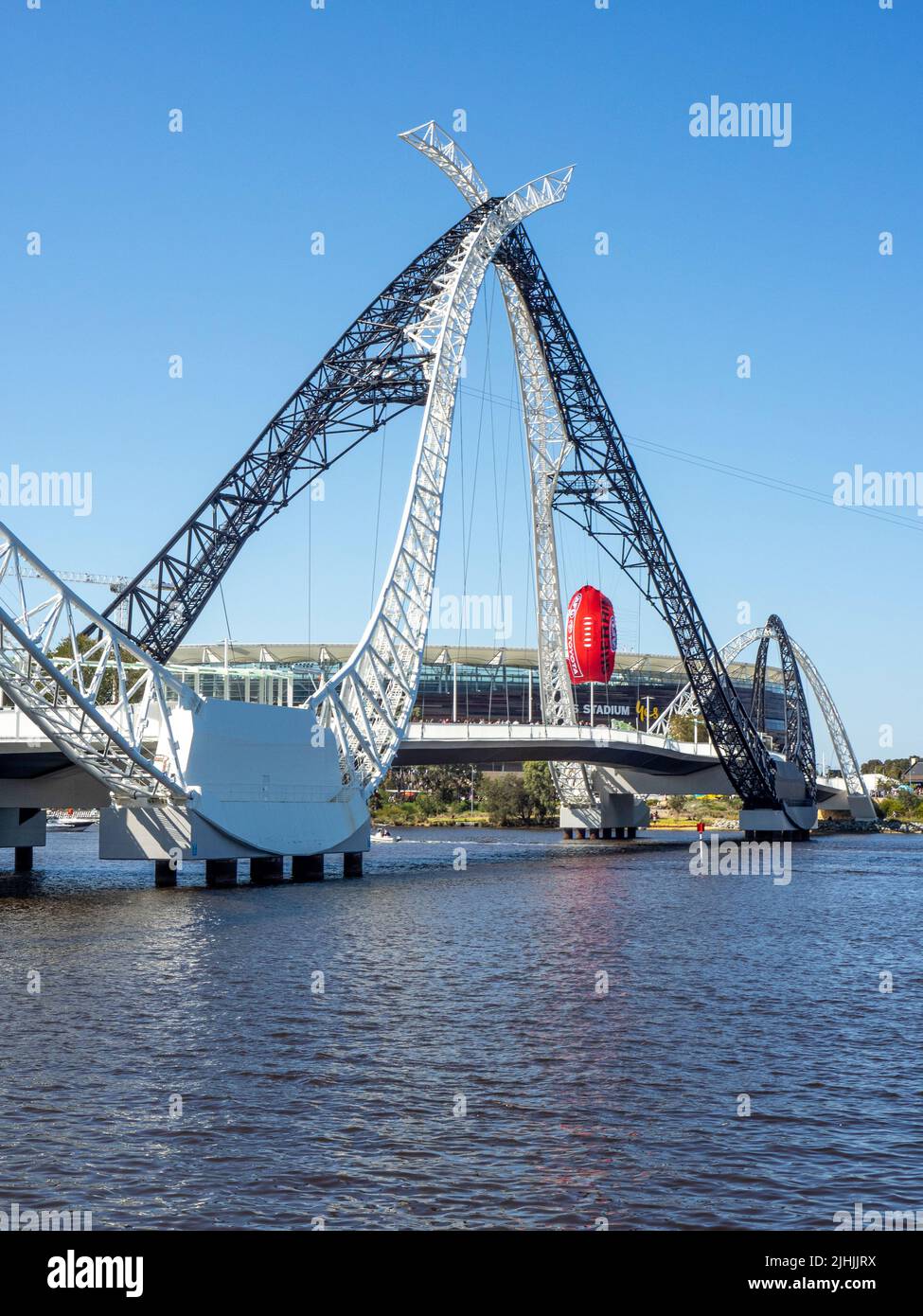 Spectators walking across Matagarup Bridge with a suspended inflatable ...