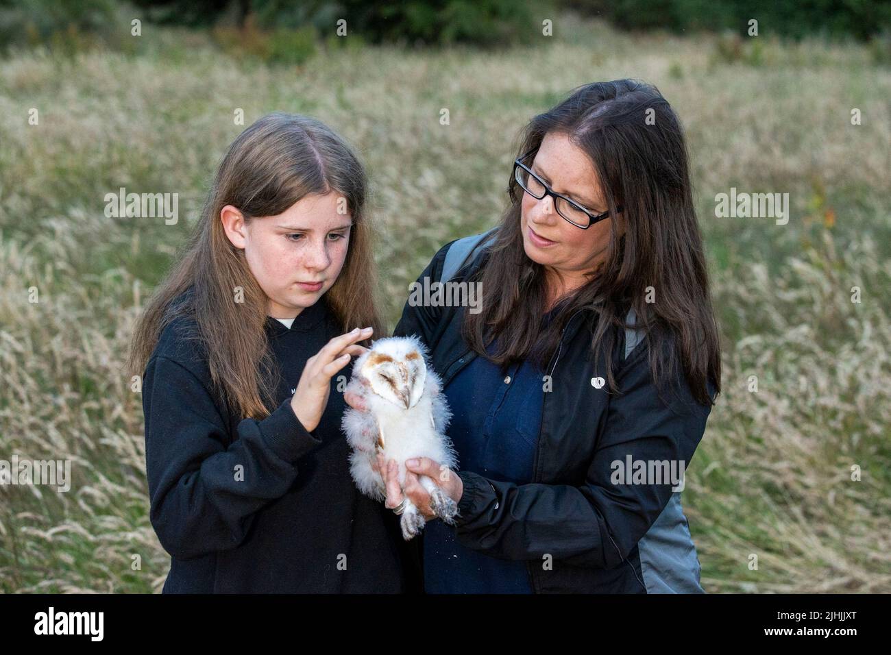 Roisin McDade (right) with her daughter Erin holds one of four Barn ...