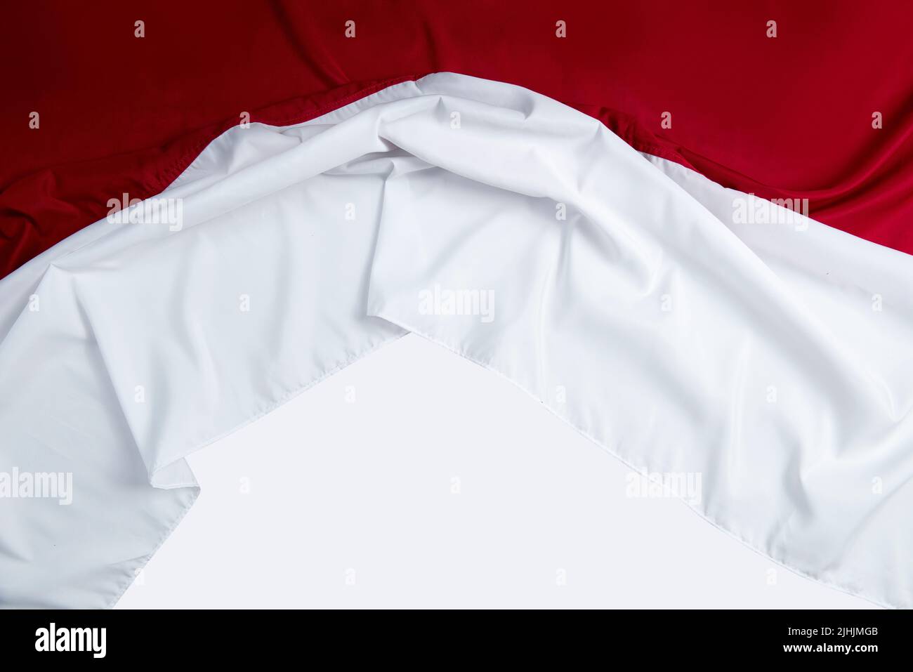 The red and white flag of Indonesian flag isolated over white ...