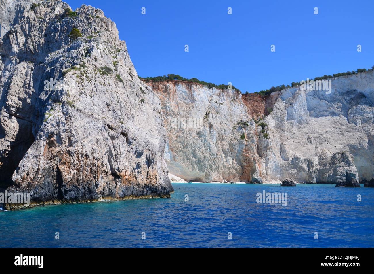 white rocks at the steep coast of Zakynthos island, greece Stock Photo ...