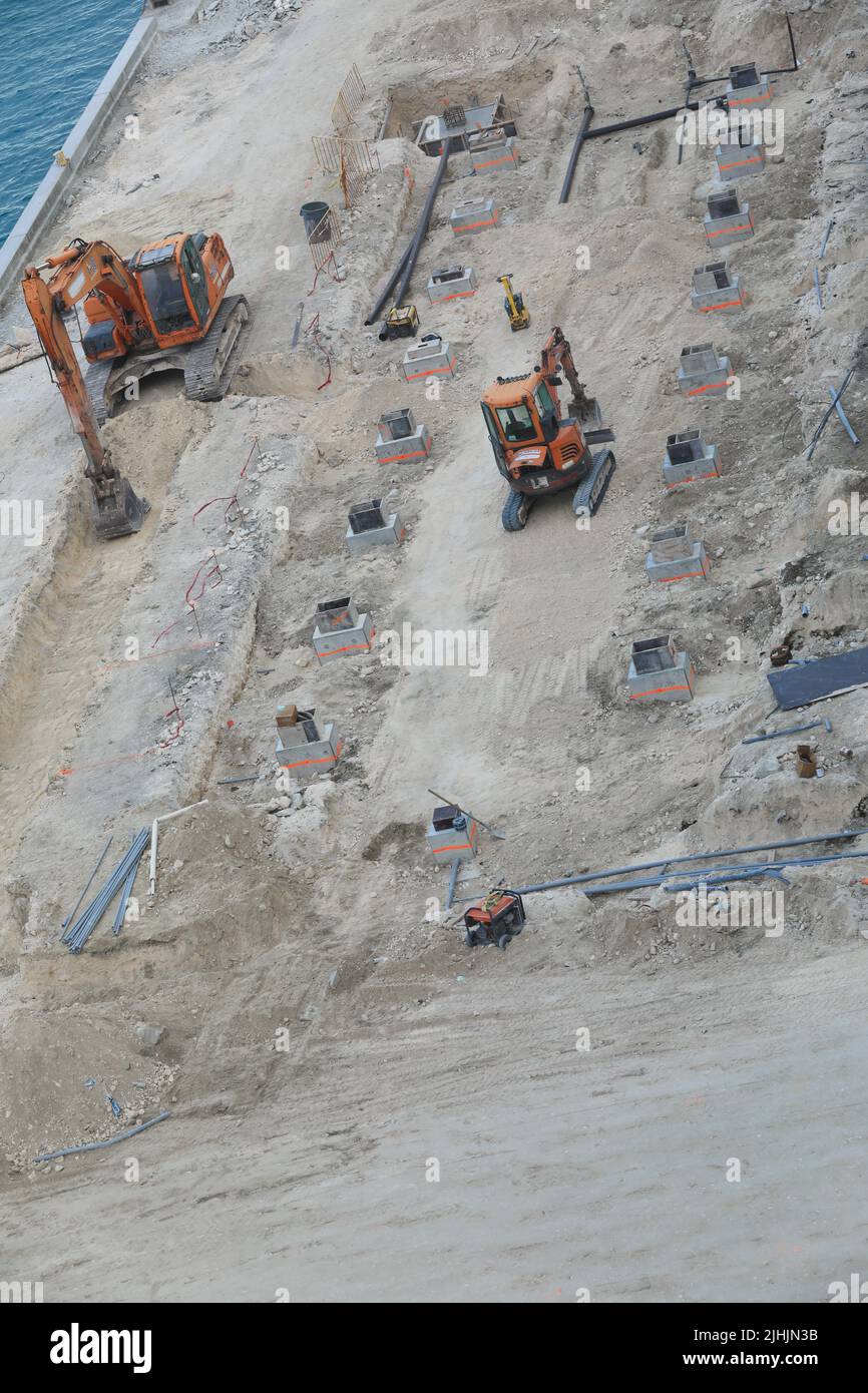 pile driver at a construction site on a summer cloudy day in the ...