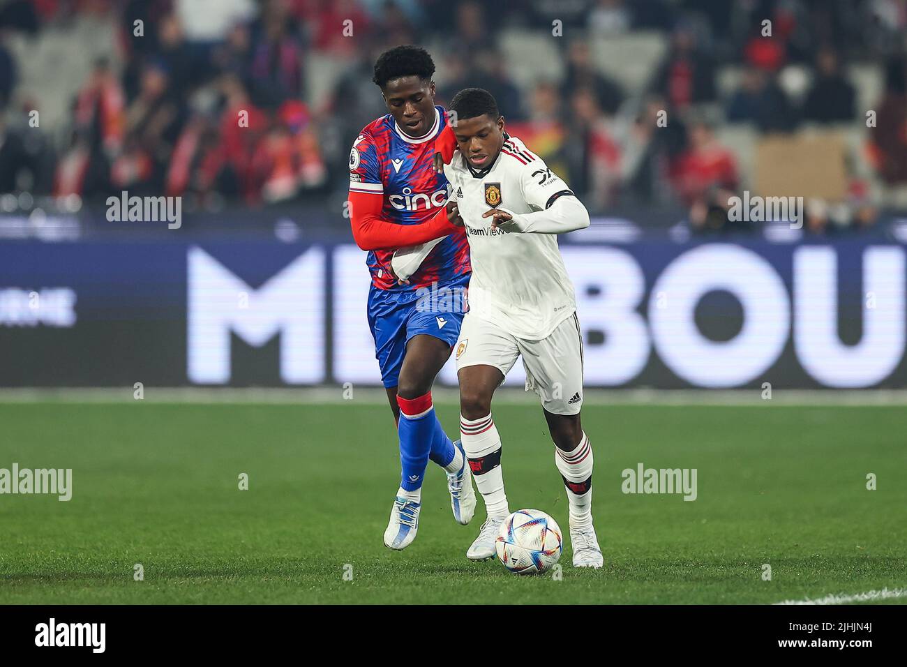 Tyrell Malacia (12) of Manchester United and Malcolm Ebiowei (23) of ...