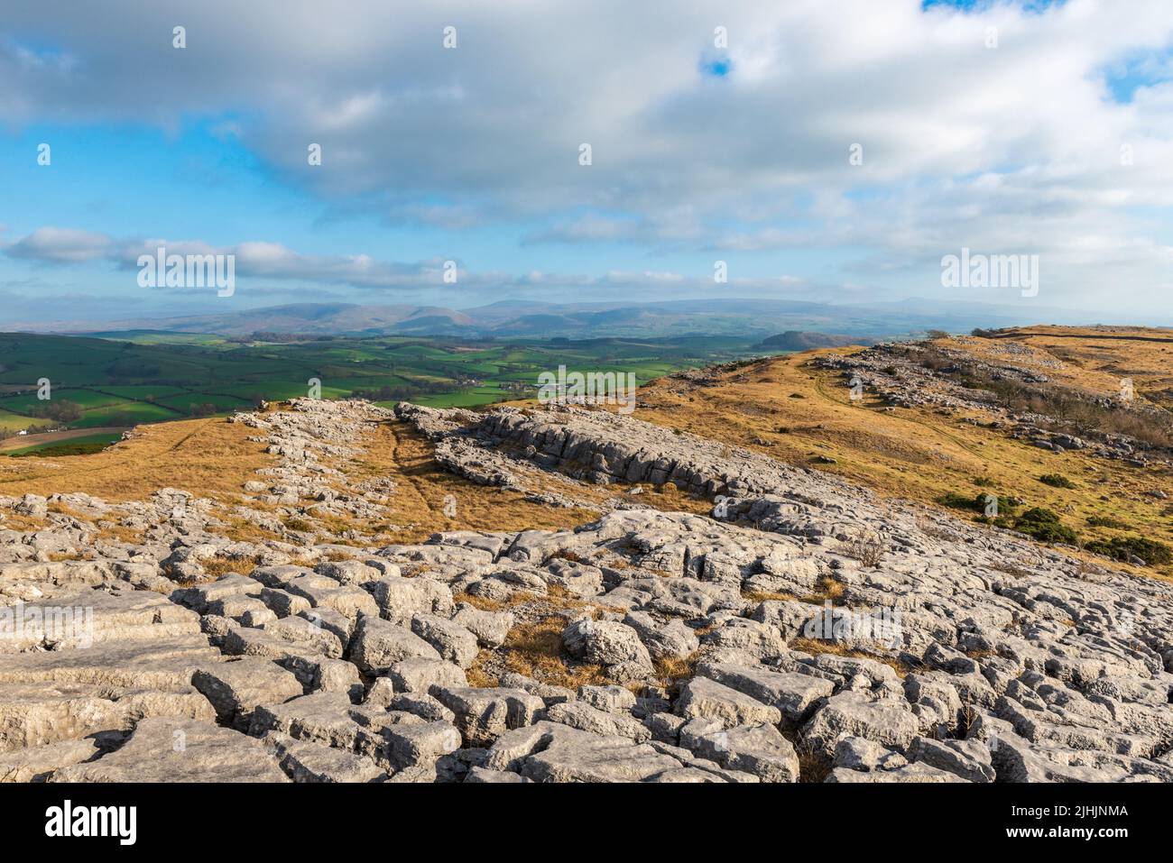 Slanting limestone pavement on Farleton Knott above Holme in Cumbria ...