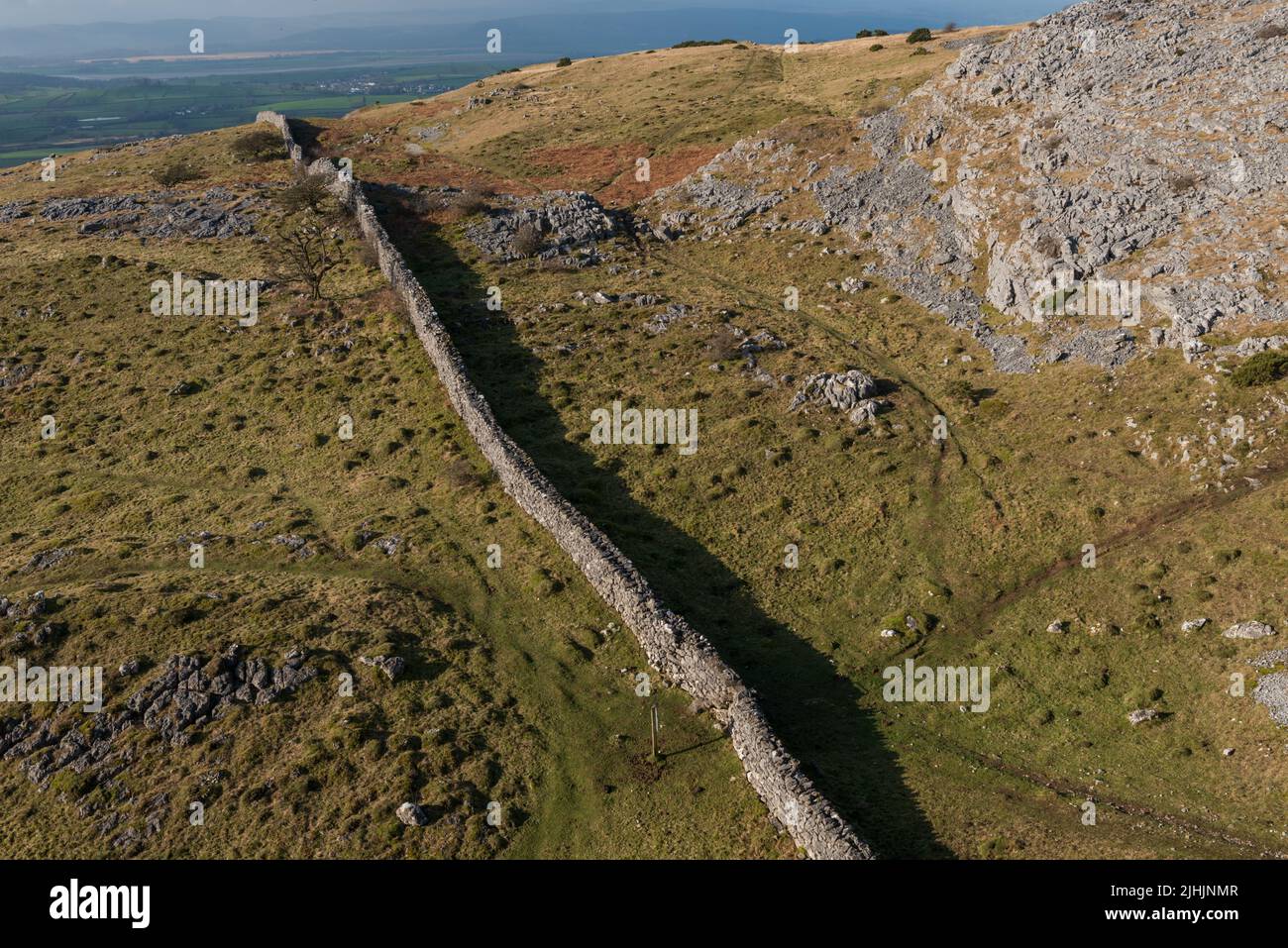 Wall across Farleton Knott above Holme in Cumbria Stock Photo - Alamy