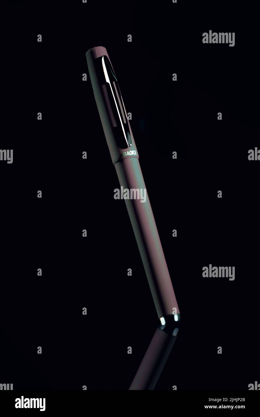 Pen shoot in studio Stock Photo - Alamy