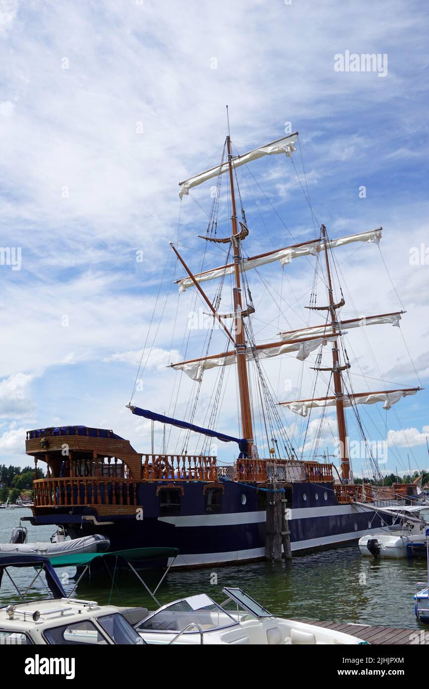 Wooden tall ship standing in port Stock Photo - Alamy