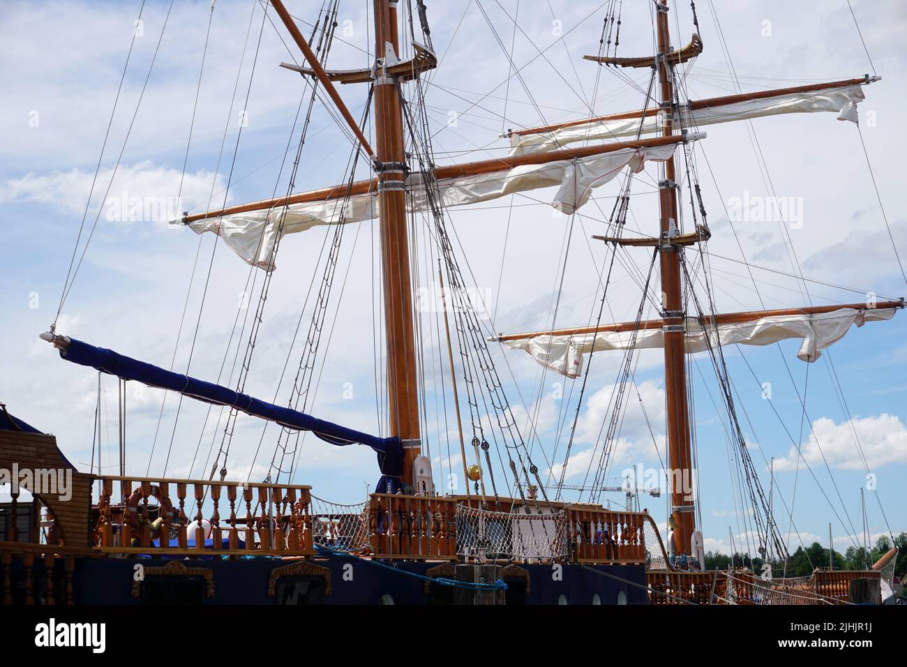 Wooden tall ship standing in port Stock Photo - Alamy