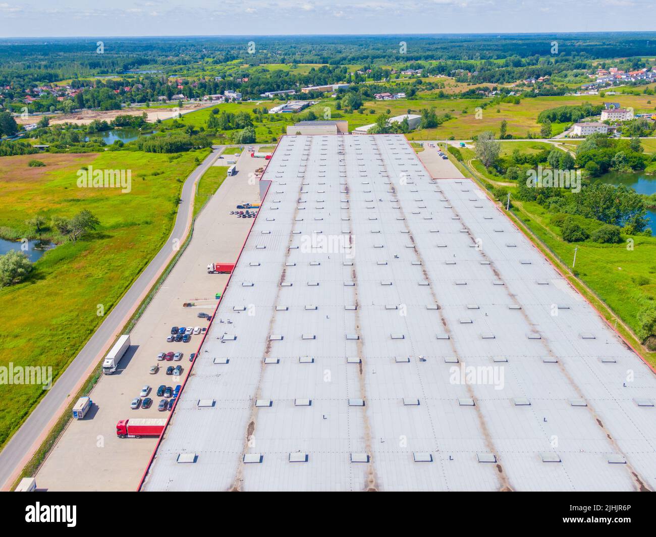 Warehouse storages or industrial factory or logistics center from above ...