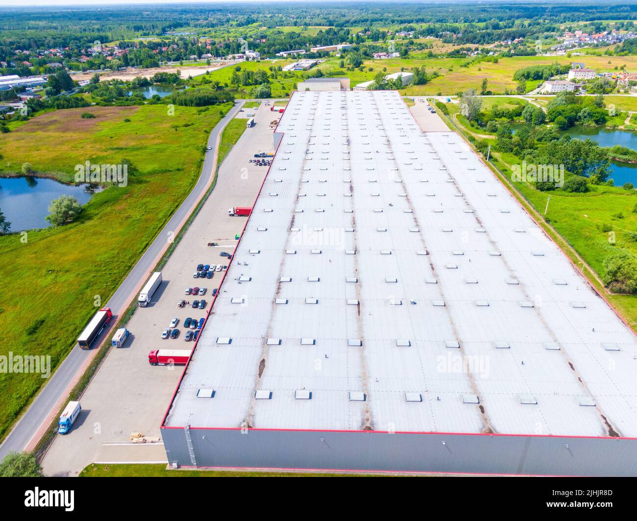 Warehouse storages or industrial factory or logistics center from above ...