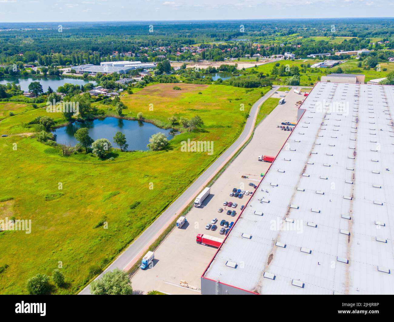 Warehouse storages or industrial factory or logistics center from above ...