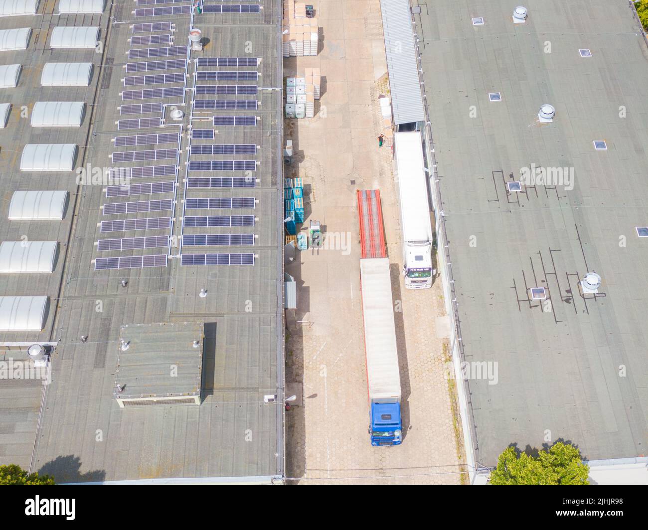 Aerial view of goods warehouse. Logistics center delivery in industrial ...