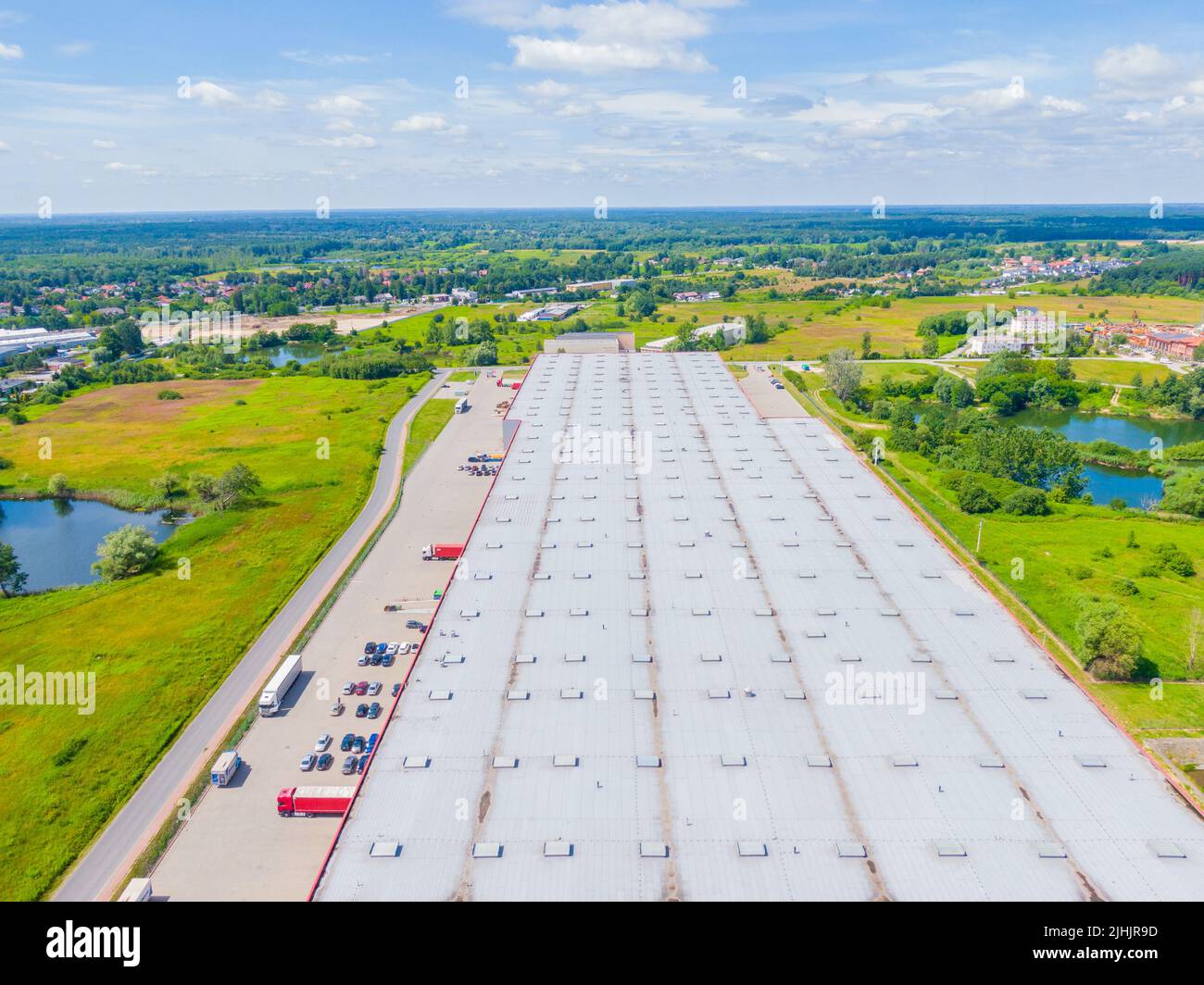 Warehouse storages or industrial factory or logistics center from above ...
