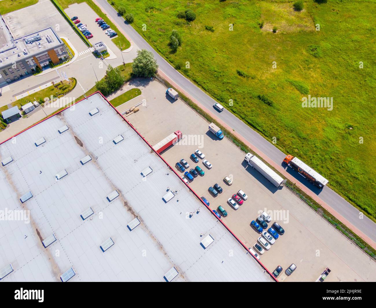 Warehouse storages or industrial factory or logistics center from above ...