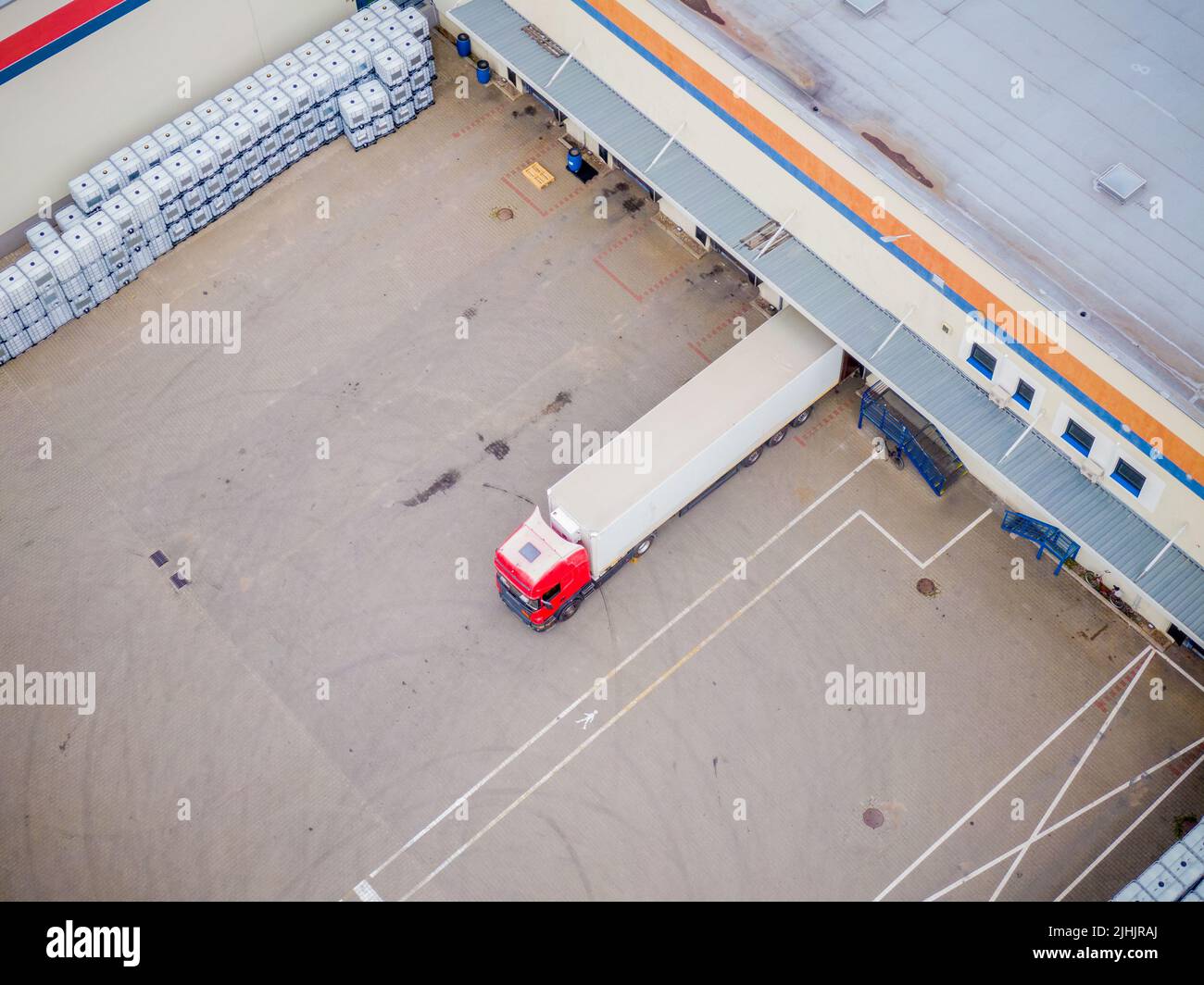 Aerial view of goods warehouse. Logistics center delivery in industrial ...