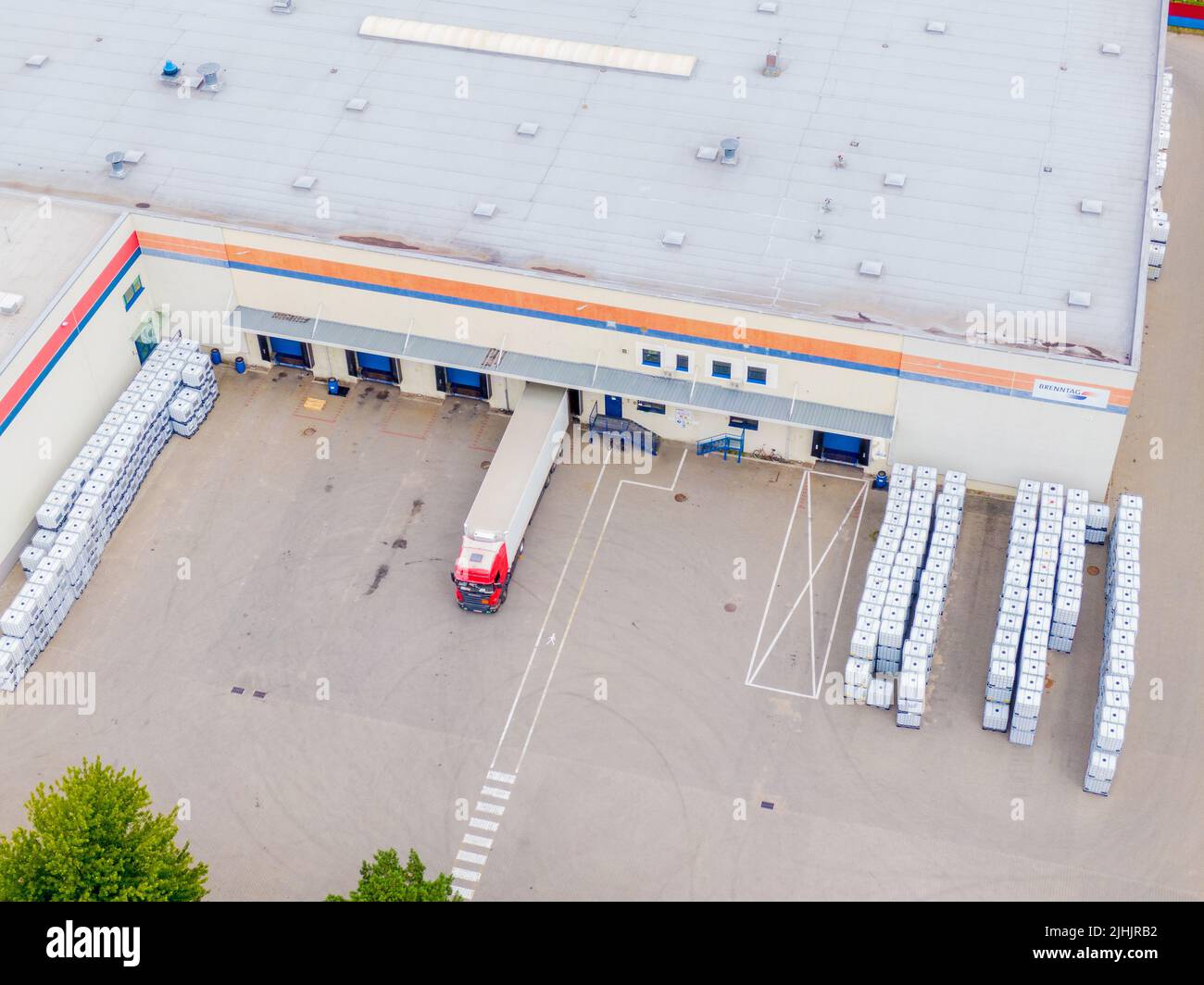 Aerial view of goods warehouse. Logistics center delivery in industrial ...