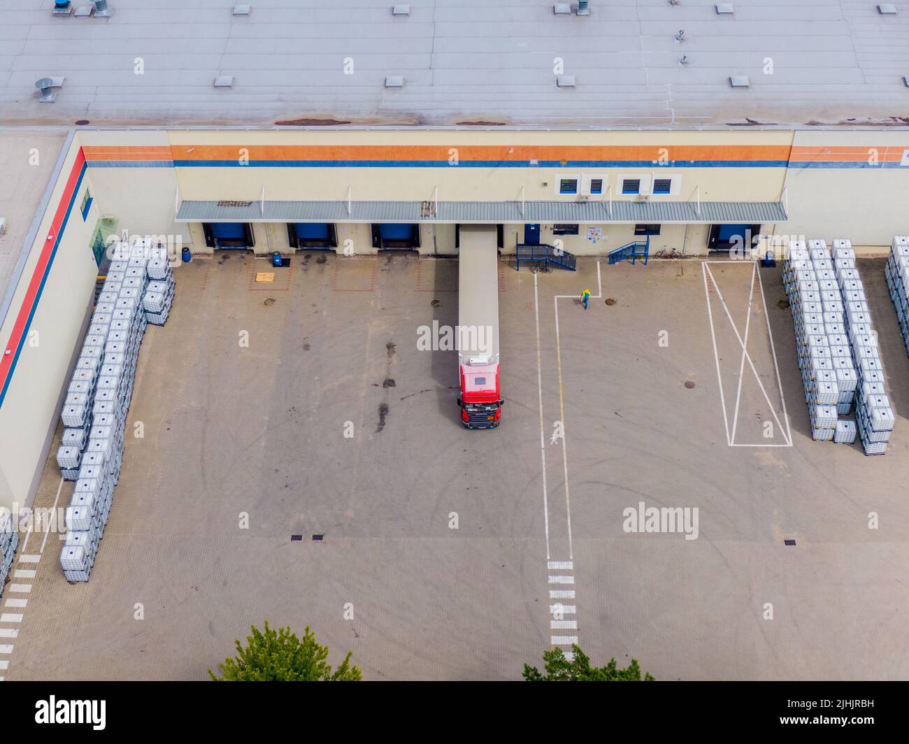 Aerial view of goods warehouse. Logistics center delivery in industrial ...