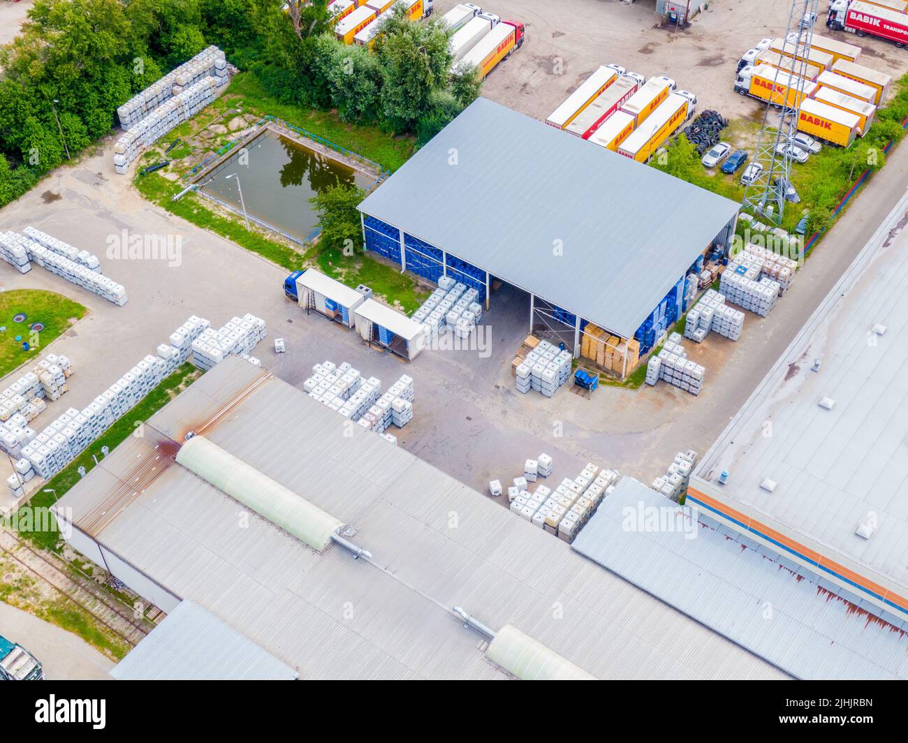 Aerial view of goods warehouse. Logistics center delivery in industrial ...