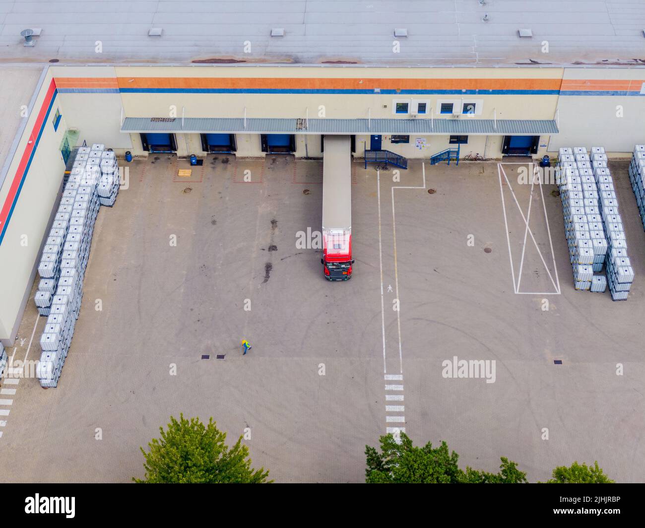 Aerial view of goods warehouse. Logistics center delivery in industrial ...