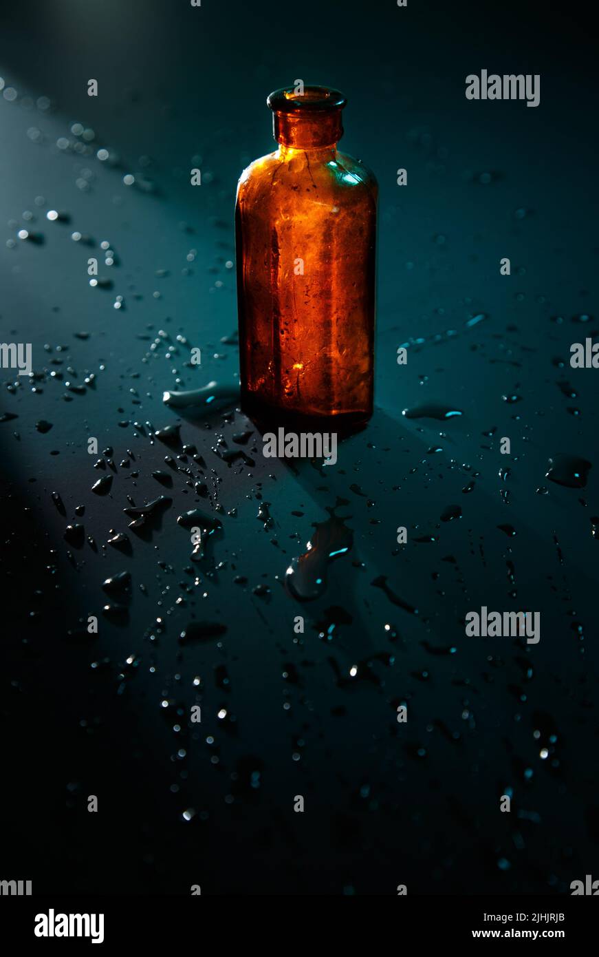 Spilled orange liquid still life hi-res stock photography and images ...