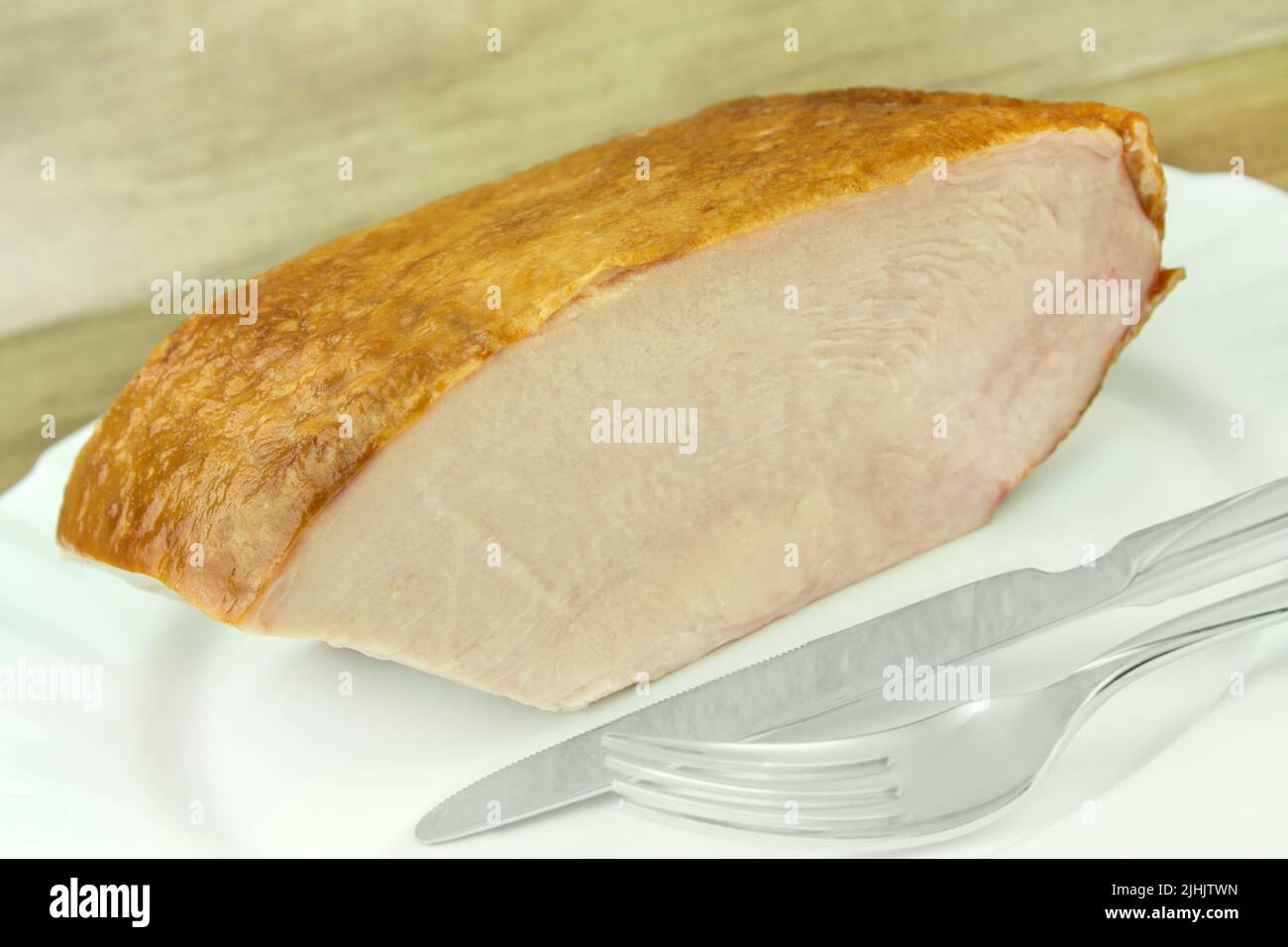 Smoked Turkey Hen with knife and fork Stock Photo - Alamy
