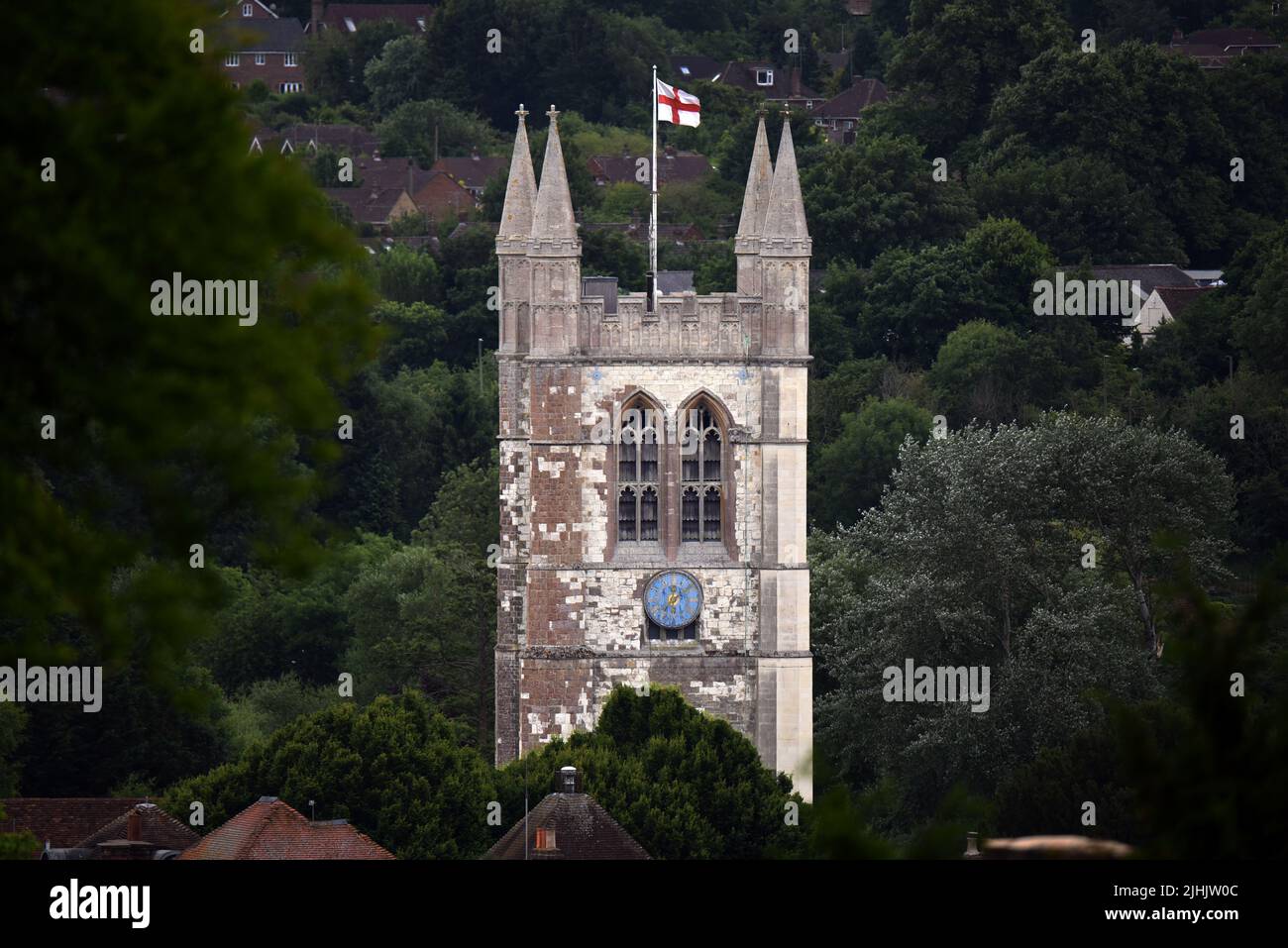 Saint Andrew's church in Farnham stands out clearly against a luscious ...