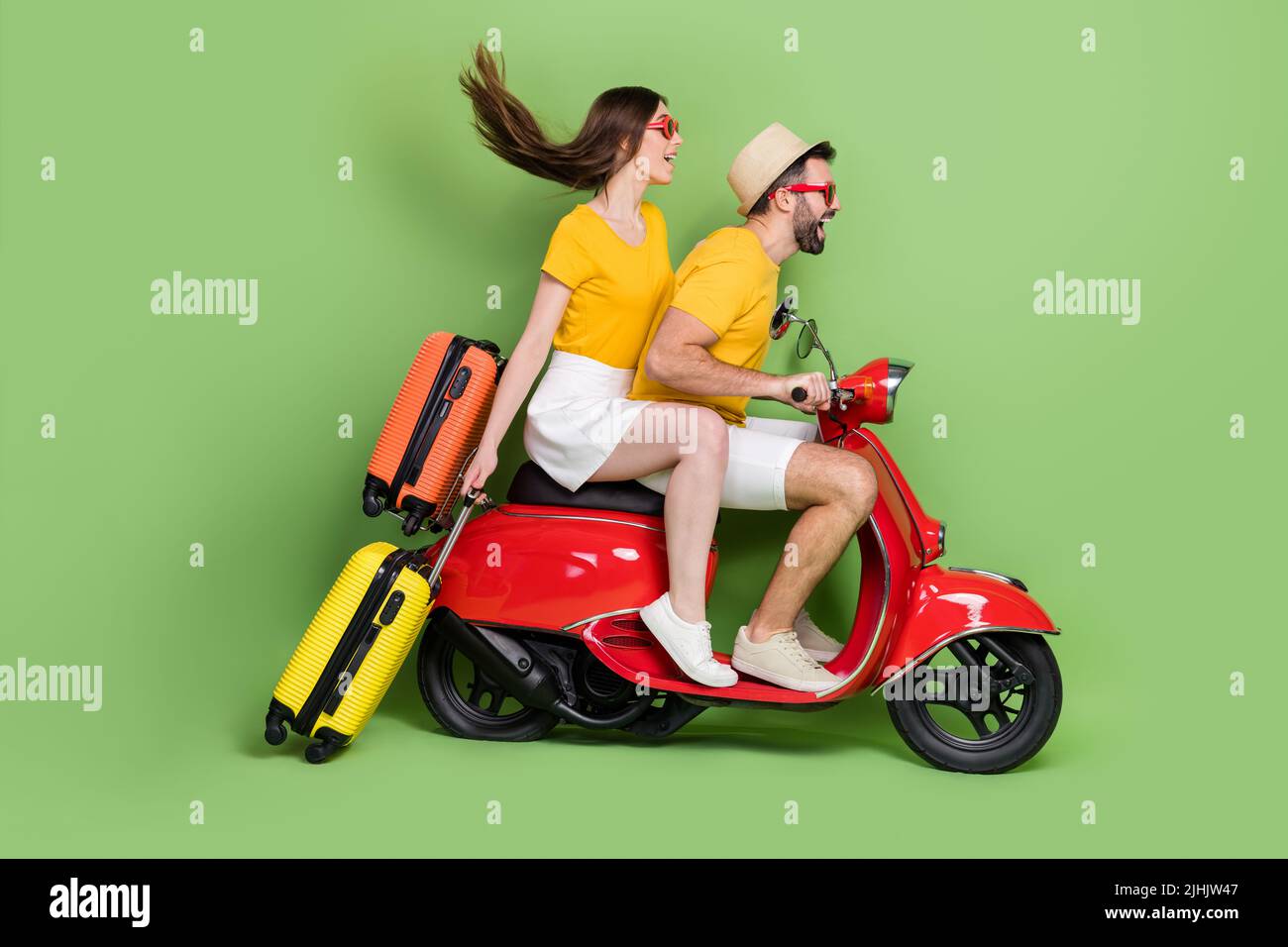 Full body profile portrait of two carefree crazy people drive moped ...