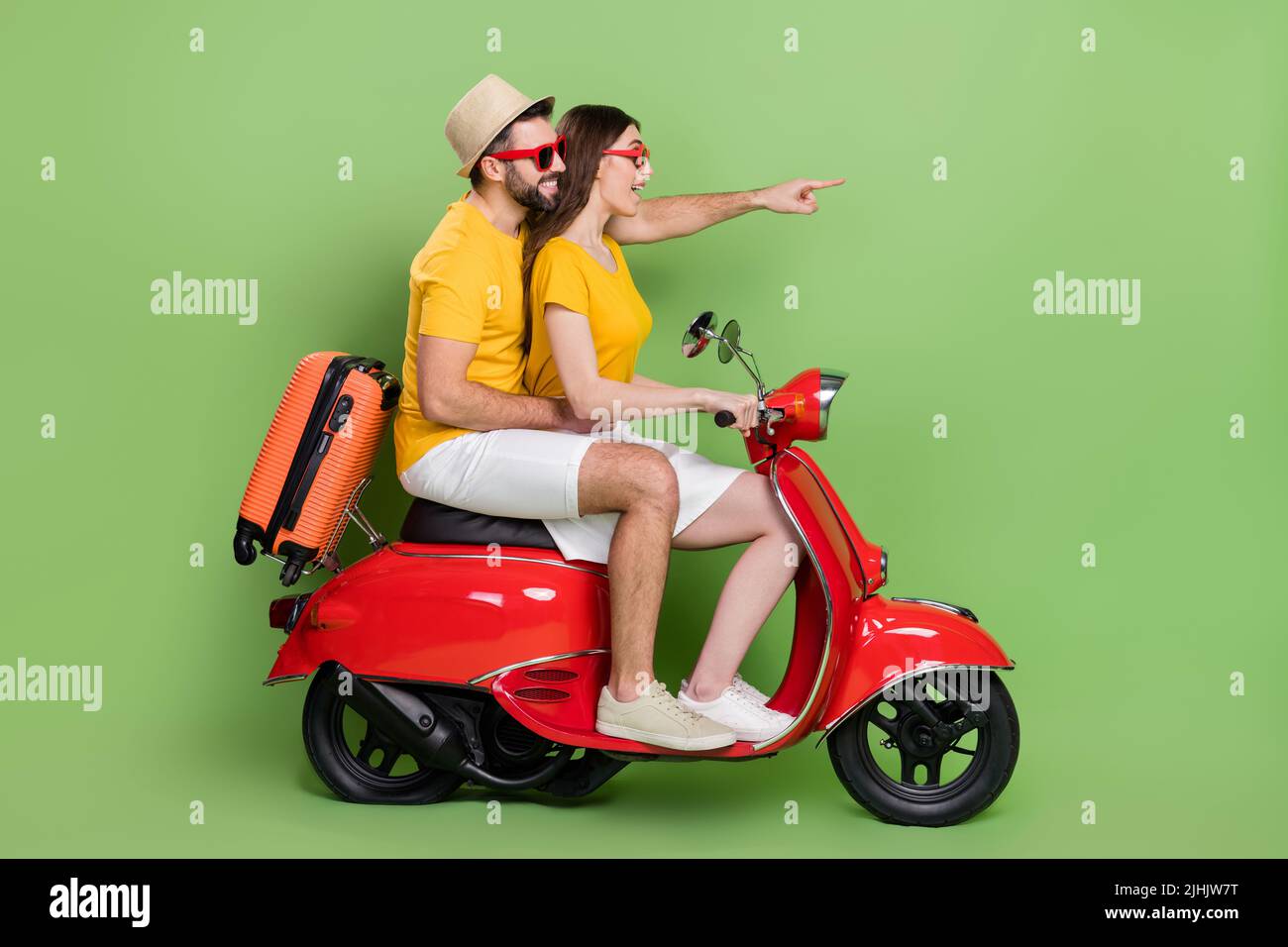 Full size profile portrait of two positive partners drive moped point ...