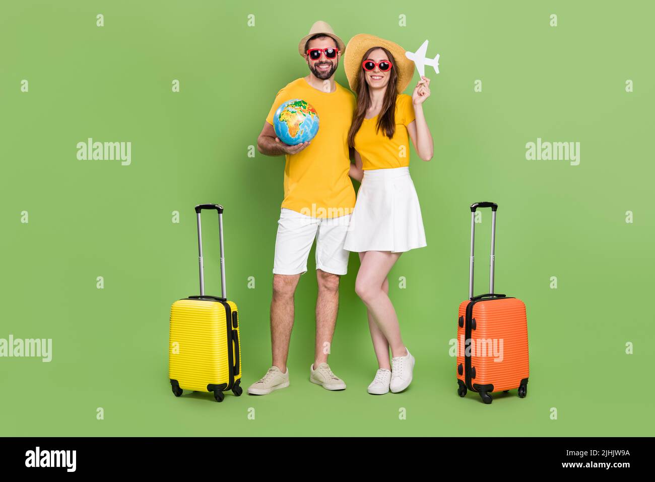 Full size portrait of attractive lady handsome guy hold globe paper ...